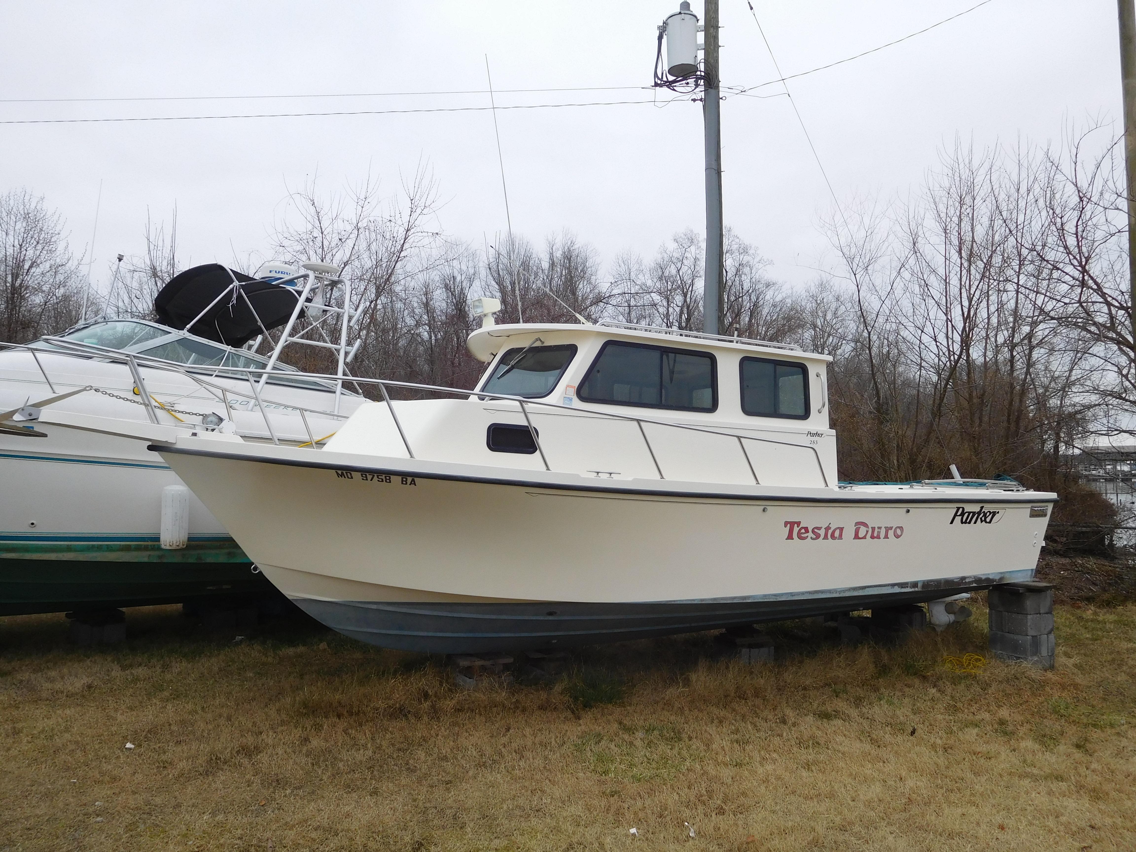 1996 Parker 2530 Extended Cabin | Dominion Yachts