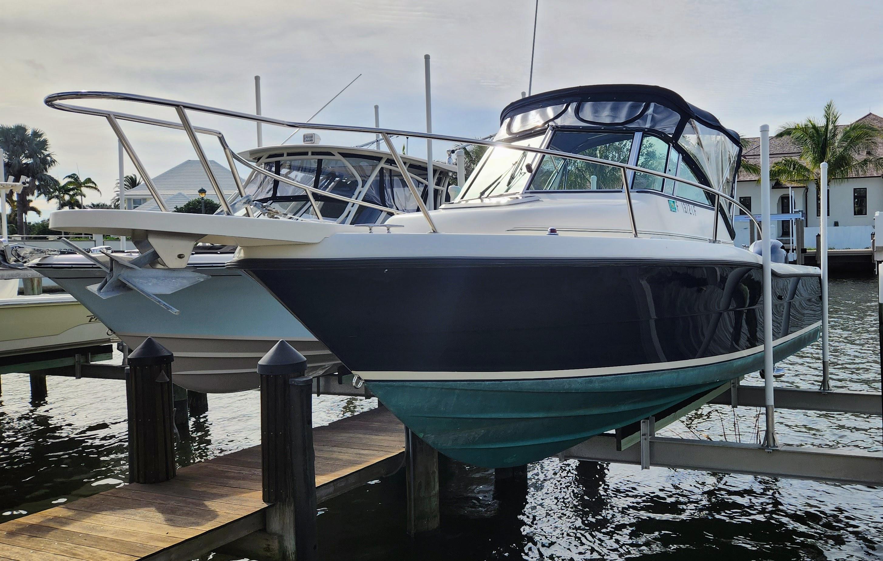 2000 Pursuit 2470 Walkaround Cuddy Cabin for sale - YachtWorld